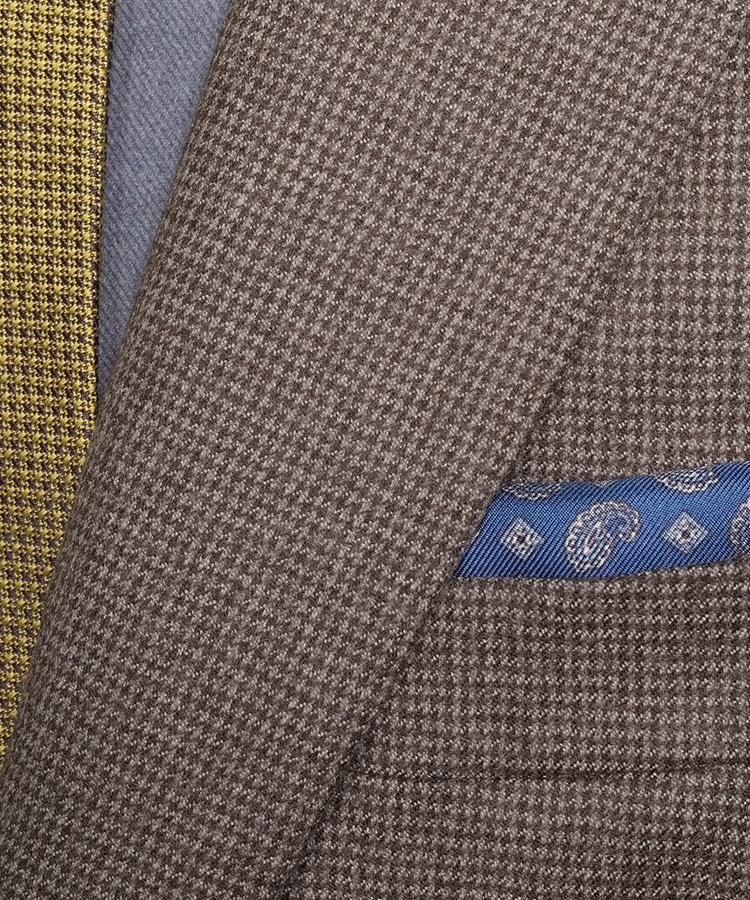 light brown patterned suit